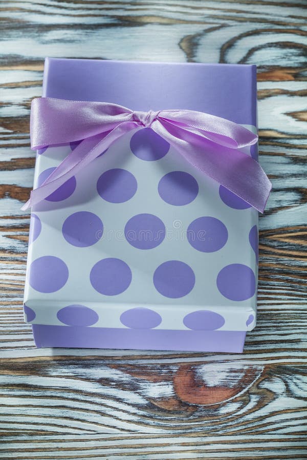 Purple Present Box on Vintage Wooden Board Stock Image - Image of ...