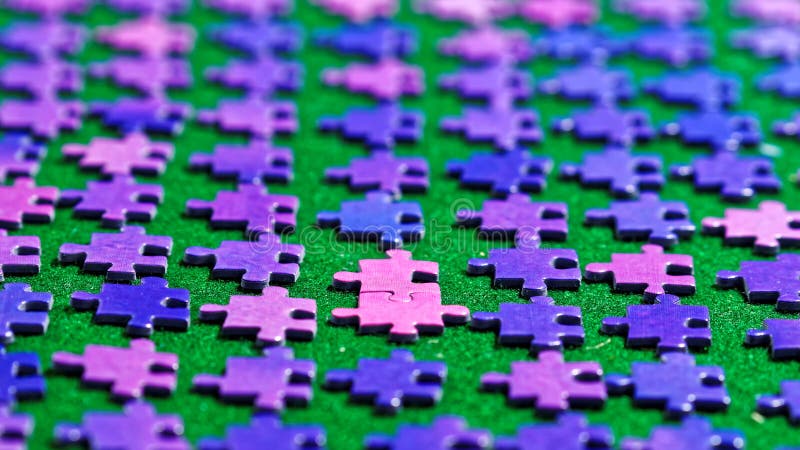 Purple Puzzle Pieces Sorted on a Green Table Cloth Stock Photo - Image ...