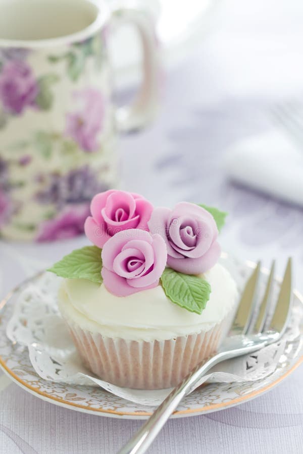 Purple rose cupcake stock image. Image of frosted, fork - 12719493