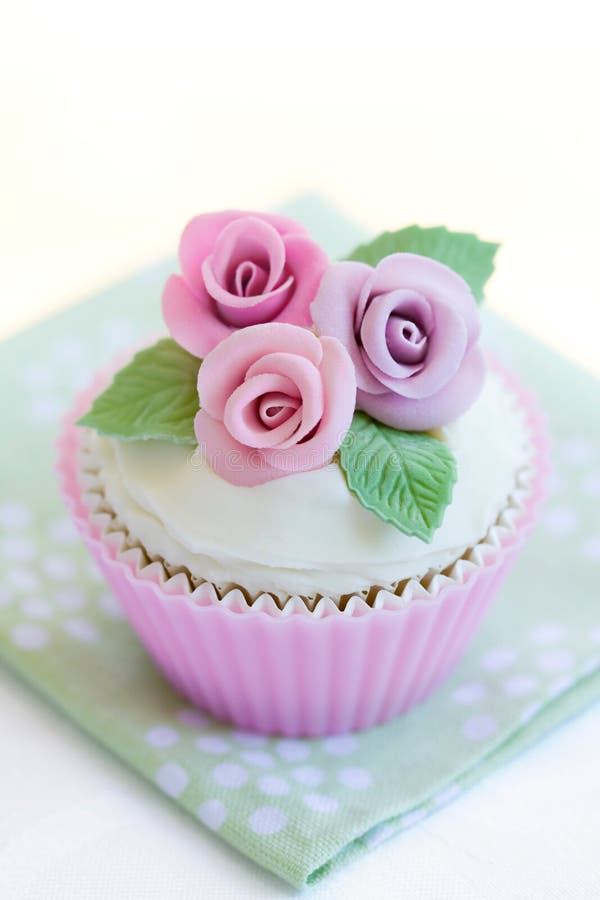 Purple rose cupcake stock image. Image of cake, icing - 13300893