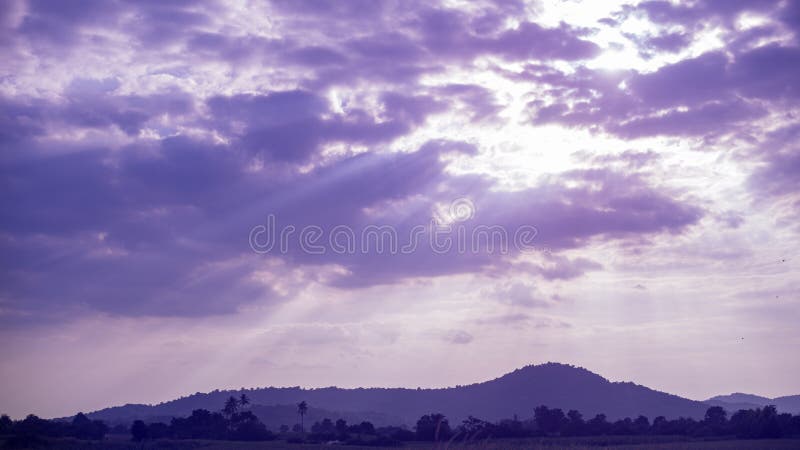 Purple sky with light stock photo. Image of black, scenic - 214421916
