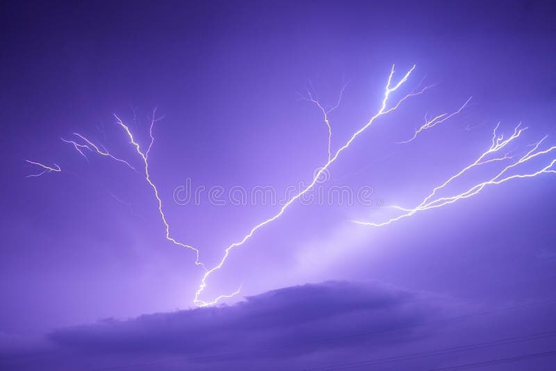 A Purple Sky with a Lightning Bolt in the Middle Stock Image - Image of ...
