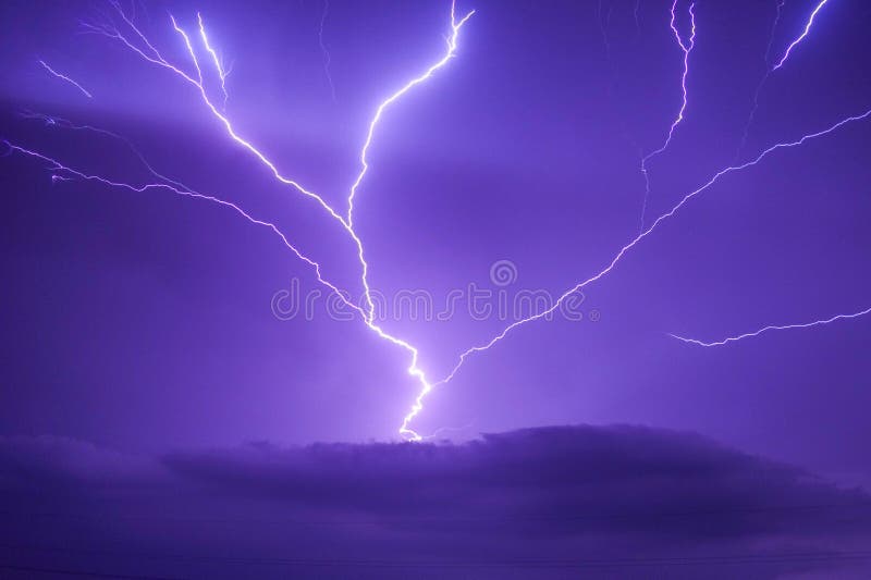 A Purple Sky with a Lightning Bolt in the Middle Stock Image - Image of ...