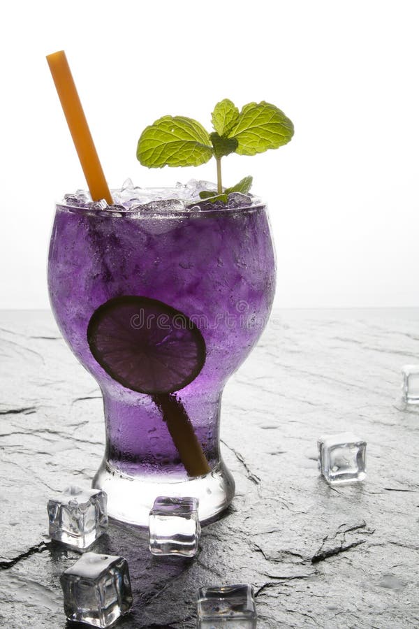 Purple Soda Lime Drink with Lime Stock Photo - Image of purple ...
