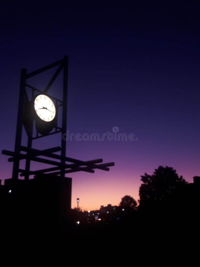 Purple Sunset Clock Tower Campus Stock Image - Image of clock, purple ...
