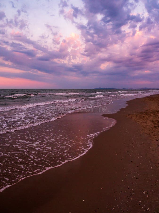 Purple Sunset on the Sandy Beach Stock Image - Image of travel, italian ...