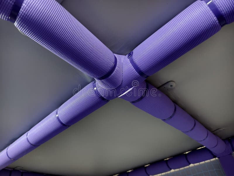 Purple Textured Pipes in Industrial Ceiling Structure with Unique ...