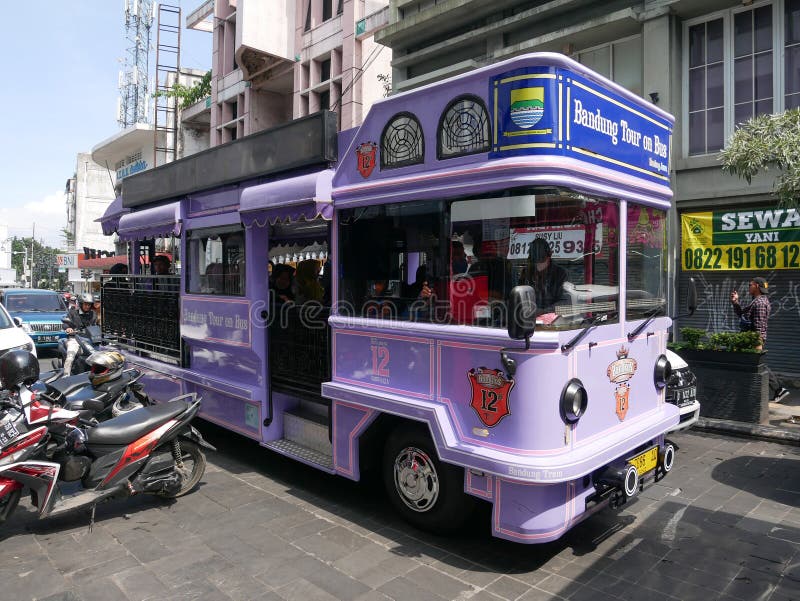Purple Tour Bus in Braga Street in Bandung, Indonesia Editorial ...