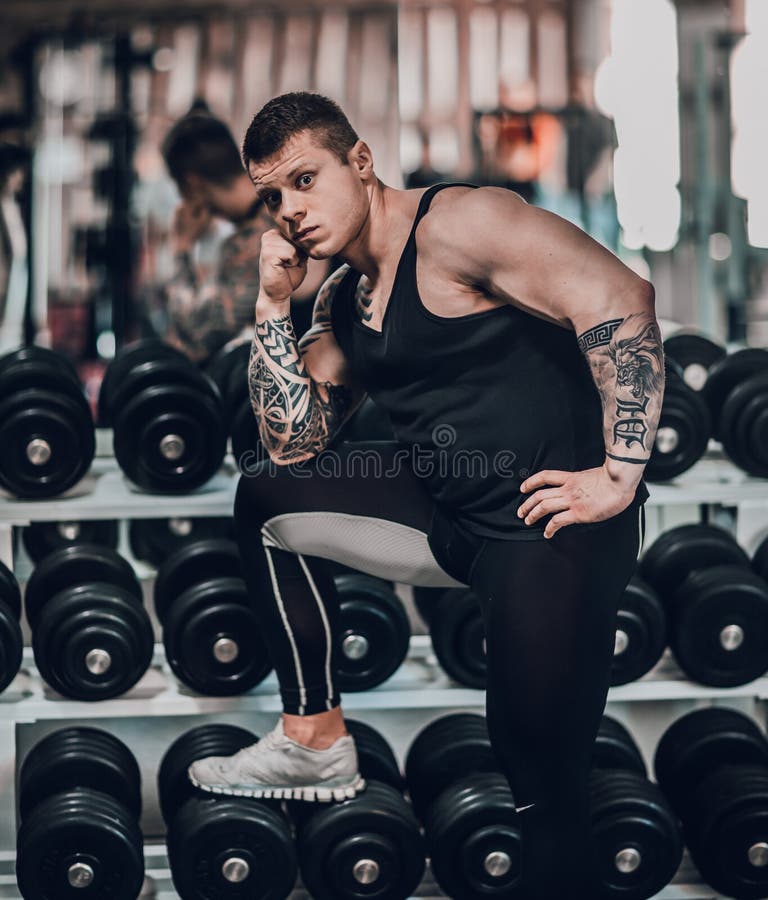 Purposeful Muscular Guy Standing in the Gym Stock Photo - Image of ...