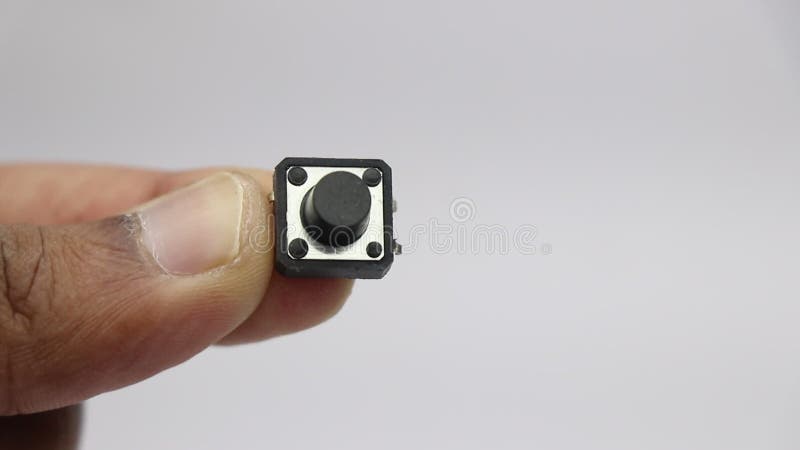 Push Button Switch Used for Electronic Projects Held in Hand Stock ...