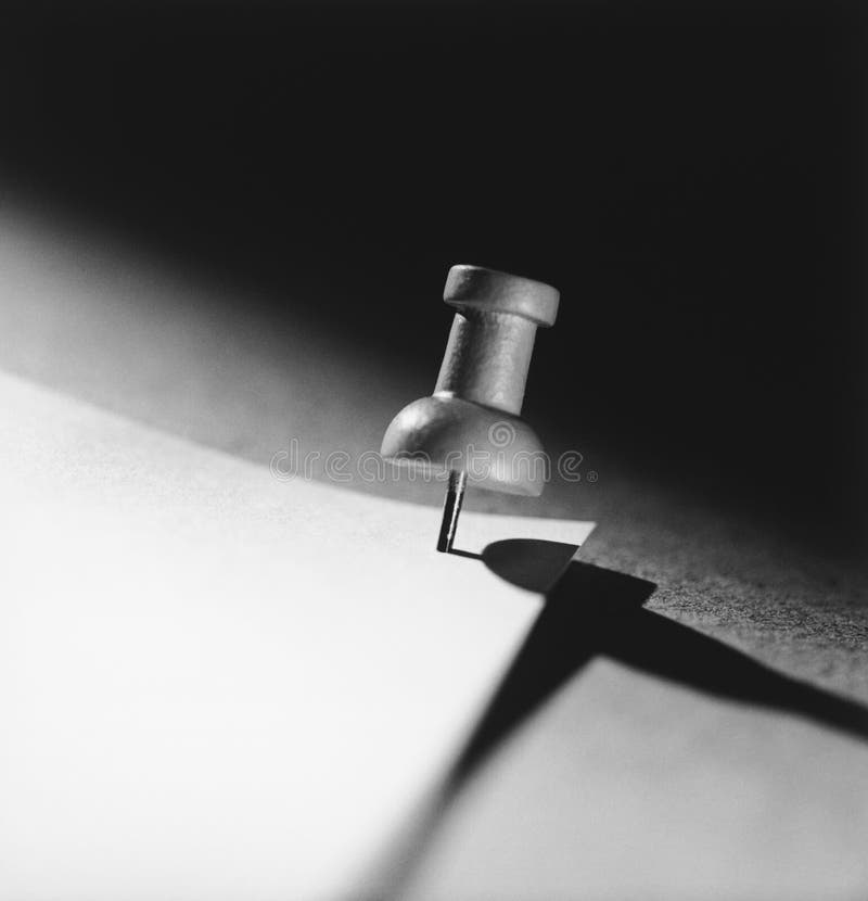 Push Pin Holding Down Paper (b&w) (close-up) Stock Image - Image of ...