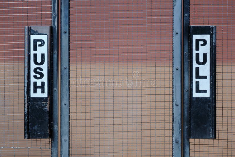 Push and Pull Signs on Gate Stock Photo - Image of closeup, fences ...