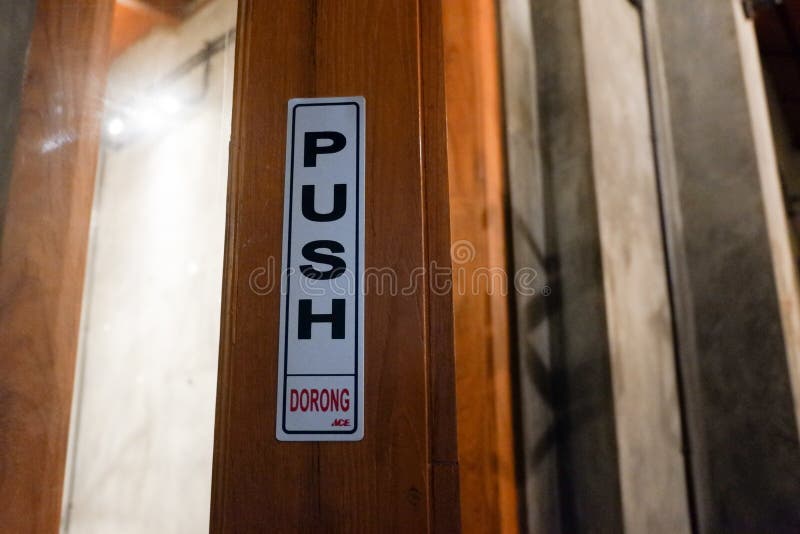 Push sign on the door stock photo. Image of lettering - 261774626
