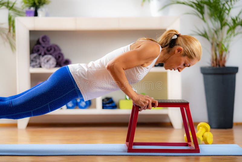 Push Ups on Jumping Stool stock photo. Image of fitness - 224785052