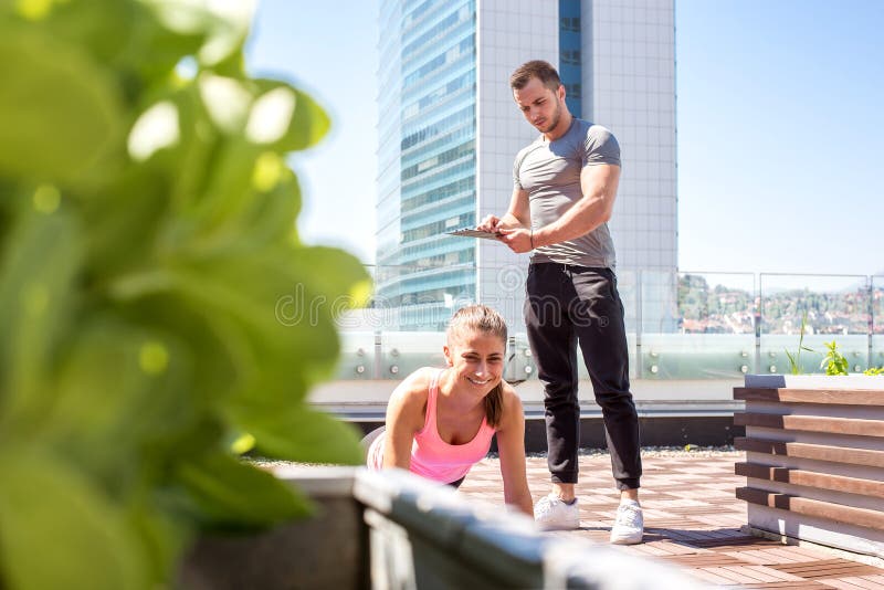 Push Ups Outdoor with Personal Trainer Support Stock Image - Image of ...