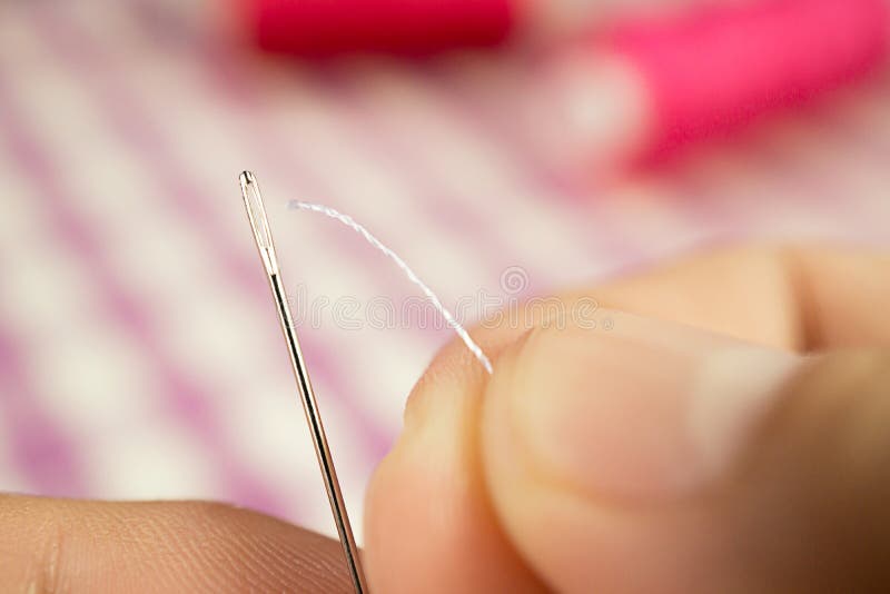 Success To Push White Thread Pass the Hole of Sewing Needle Stock Photo ...