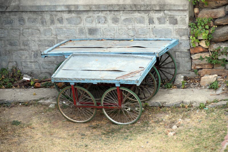 Four wheel push cart stock image. Image of spokes, compound - 140727349