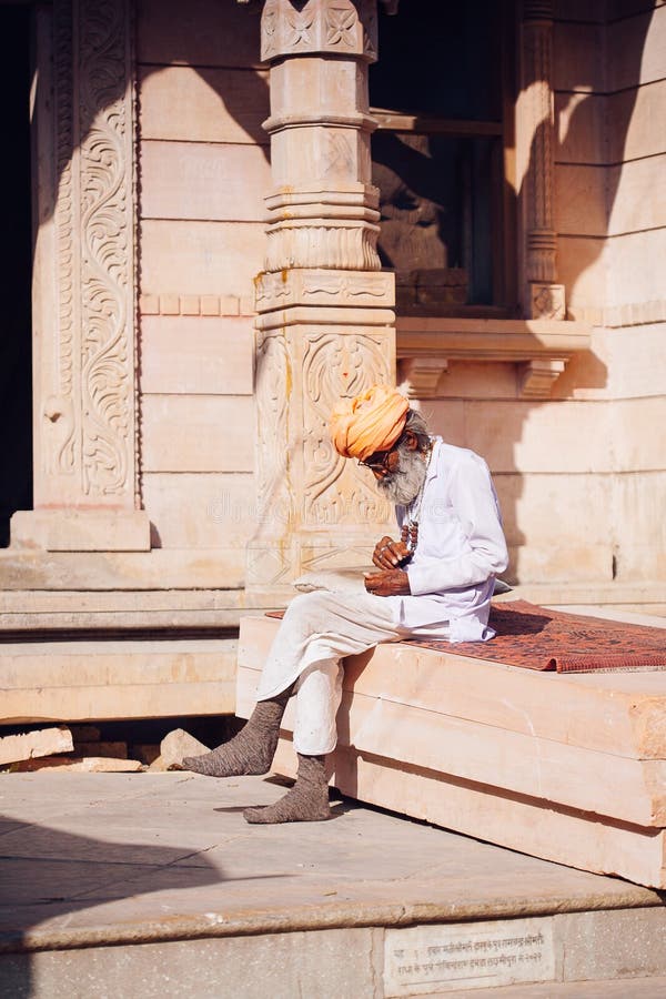 PUSHKAR, INDIA - JAN 16, 2017 Man Sitting on the Street in India ...
