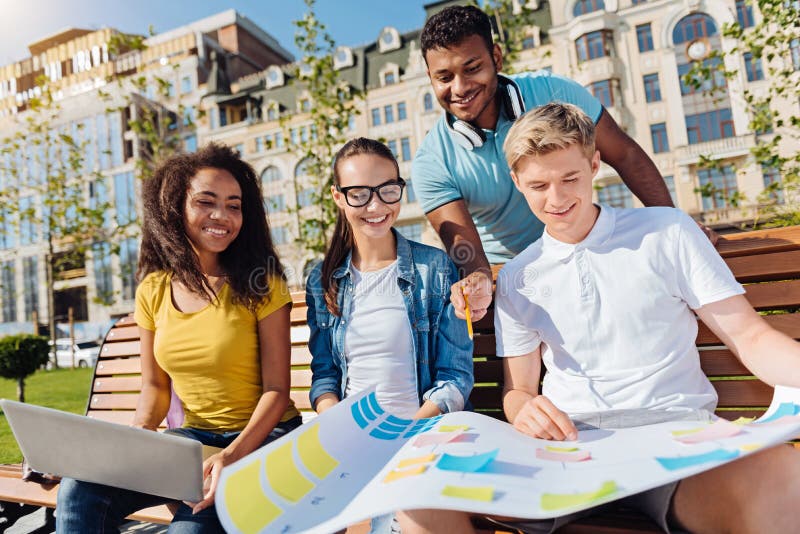 Friendly Group Mates Working Together Stock Photo - Image of gadget ...