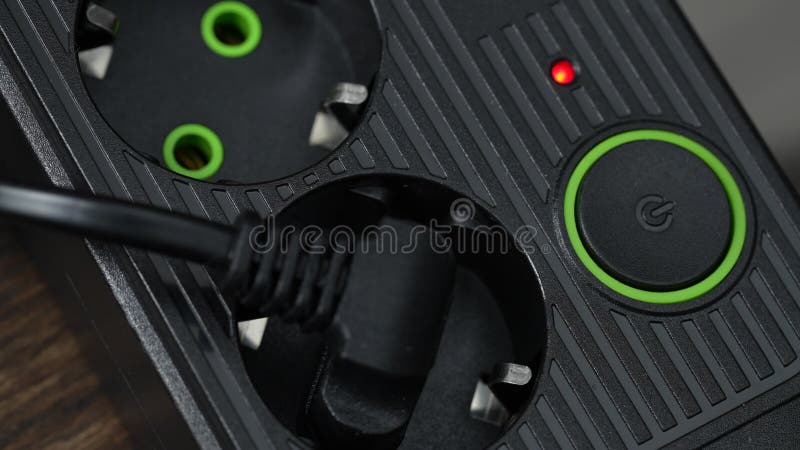 Put an Electric Plug into a Socket. Turn Off the Electricity Supply by ...