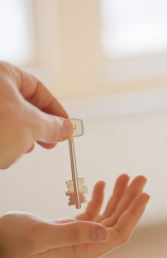 Put the key in hand stock image. Image of metal, holding - 36434471