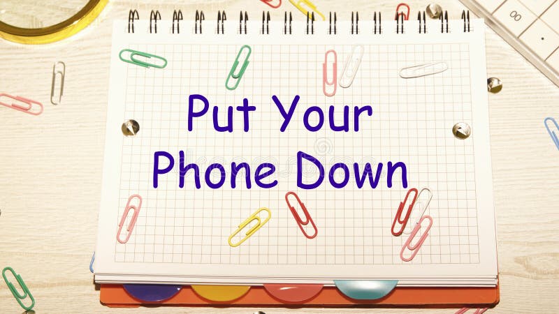 Put Your Phone Down Text is Written on the Stickers that are on the ...