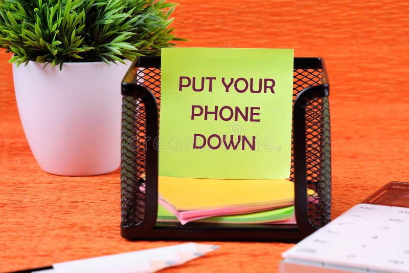 Put Your Phone Down Text is Written on the Stickers that are on the ...