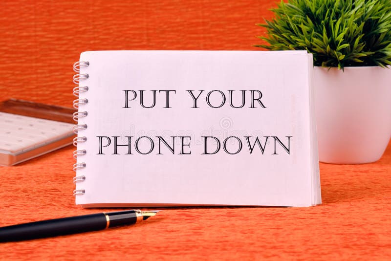 Put Your Phone Down Text is Written on the Stickers that are on the ...