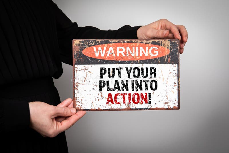 Put Your Plan into Action. Warning Sign with Text Stock Photo - Image ...