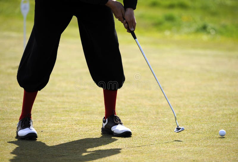 Putter, Golf Ball And Feet Picture. Image: 5476775