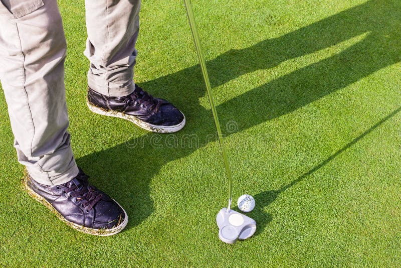 Putter on the green stock photo. Image of leisure, activity - 55247238