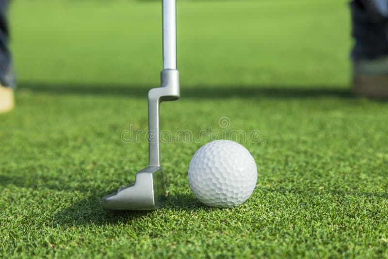 Putter Puts a Golf Ball To Hole Stock Image - Image of sunny, putter ...