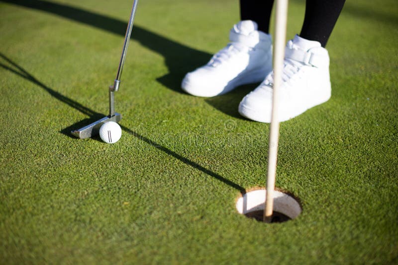 Putter Takes Aim at the Golf Course Stock Photo - Image of goal ...