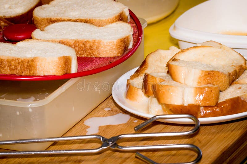 Putting Bread with Milk To Make a Typical Spanish Food Stock Photo ...