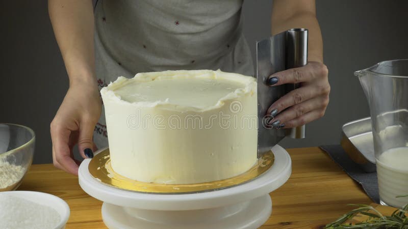 Putting Butter Cream Cake by Hand Using Spatula Stock Footage - Video ...