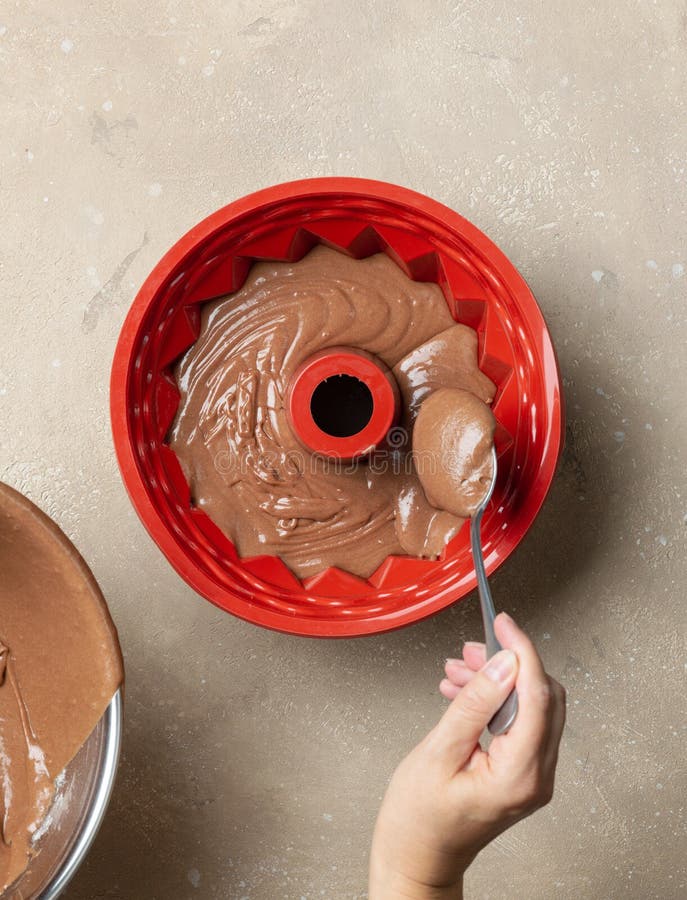 Putting Chocolate Cake Dough in Silicone Baking Form Stock Image ...