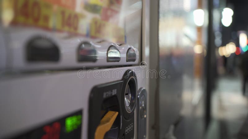 Putting Coins into a Vending Machine and Select a Drink Stock Footage ...