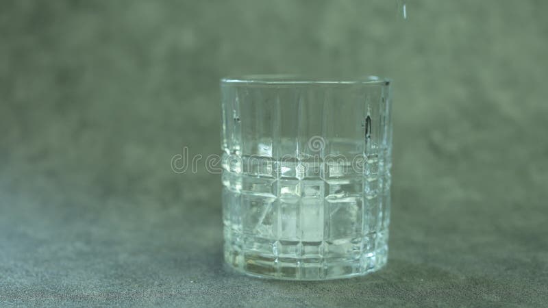 Putting A Cube Ice Into A Empty Glass Stock Footage Video Of Full