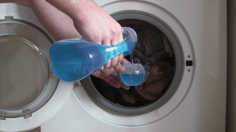 The Washing Machine is Washing Clothes, the Drum with Water and ...