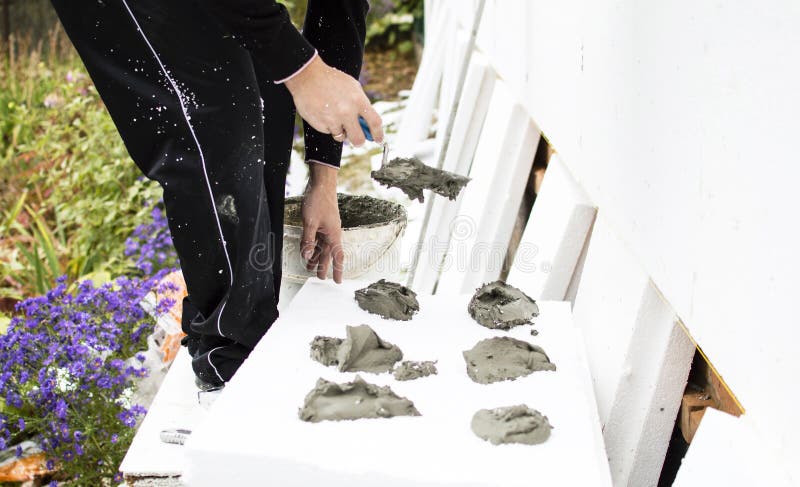 Putting glue on styrofoam stock photo. Image of material - 78799494