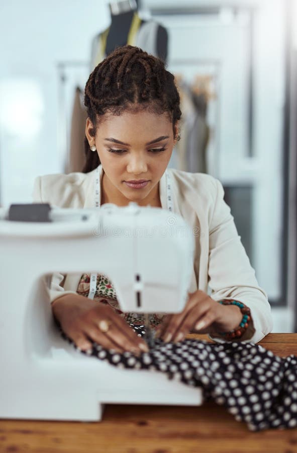 Putting Her Style into Every Stitch. a Young Fashion Designer Using a ...