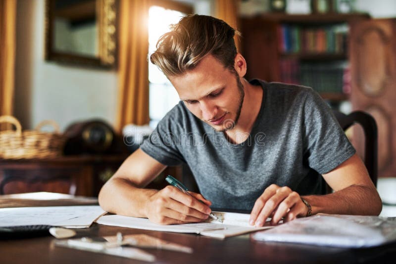 Putting His Creativity To Work. a Young Man Working on a Project at ...