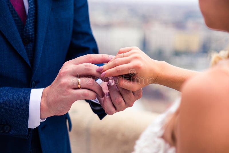 Putting Marriage Ring On The Wives Finger Wedding Ceremony Stock Image