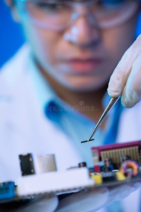 Putting Microchip on Motherboard Stock Photo - Image of memory, circuit ...