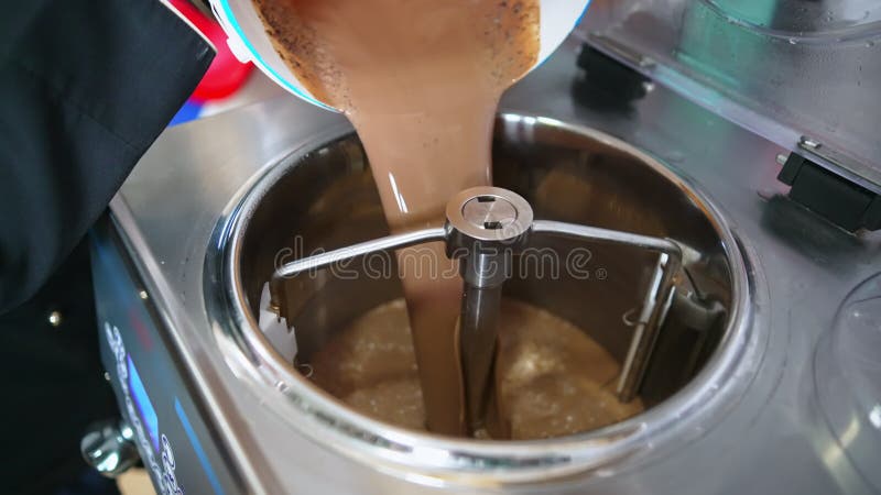 Putting Mixture into the Pasteurization Machine Rotating To Pasteurize ...