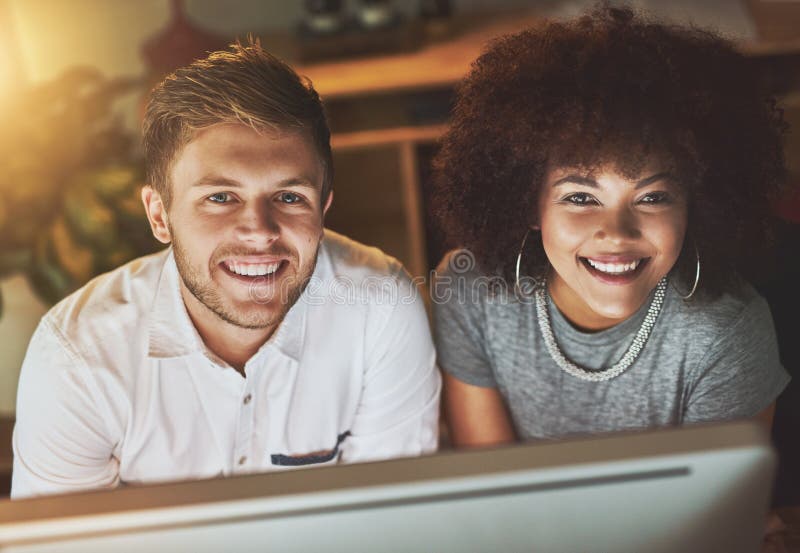 Putting Our Heads Together. Two Young Designers Working Together on a ...