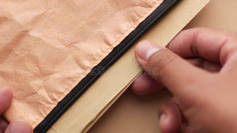 Putting Paper in a Bag on Table Stock Footage - Video of safe, woman ...