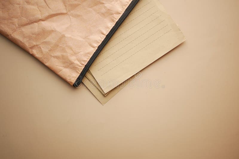 Putting Paper in a Bag on Table Stock Image - Image of wood, report ...