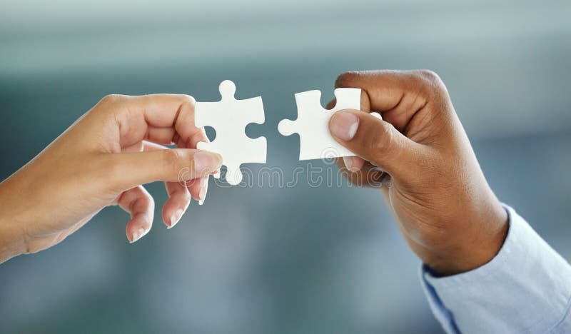 Putting the Pieces Together. Cropped Shot of Two Unrecognizable ... Putting the Pieces Together. Cropped Shot of Two Unrecognizable ...