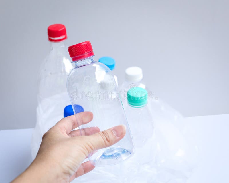 Putting Plastic Bottle Inside a Plastic Filled with Bottles Stock Image ...